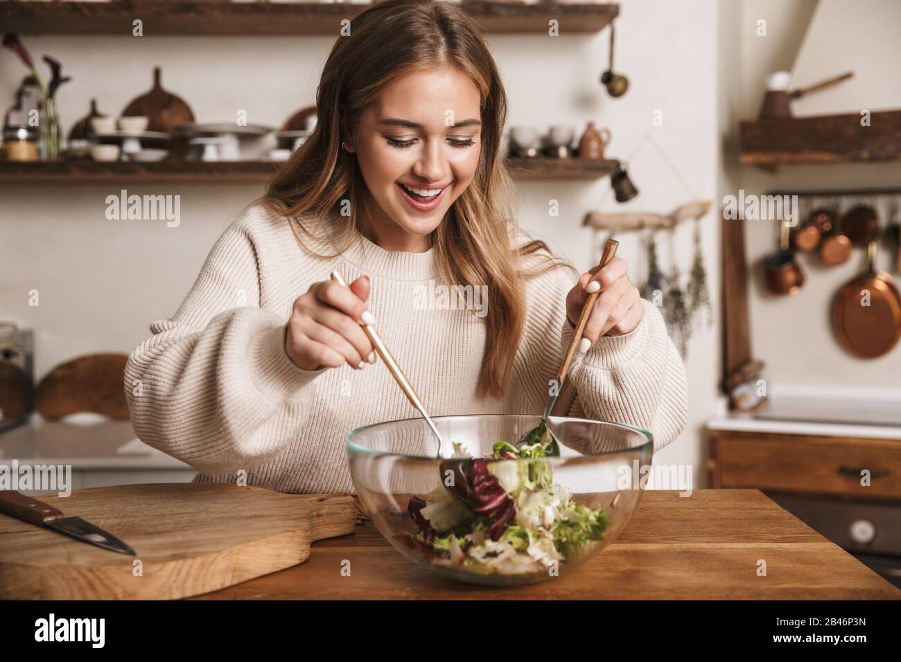 Image of pleased cute woman wearing casual clothes smiling and making ...