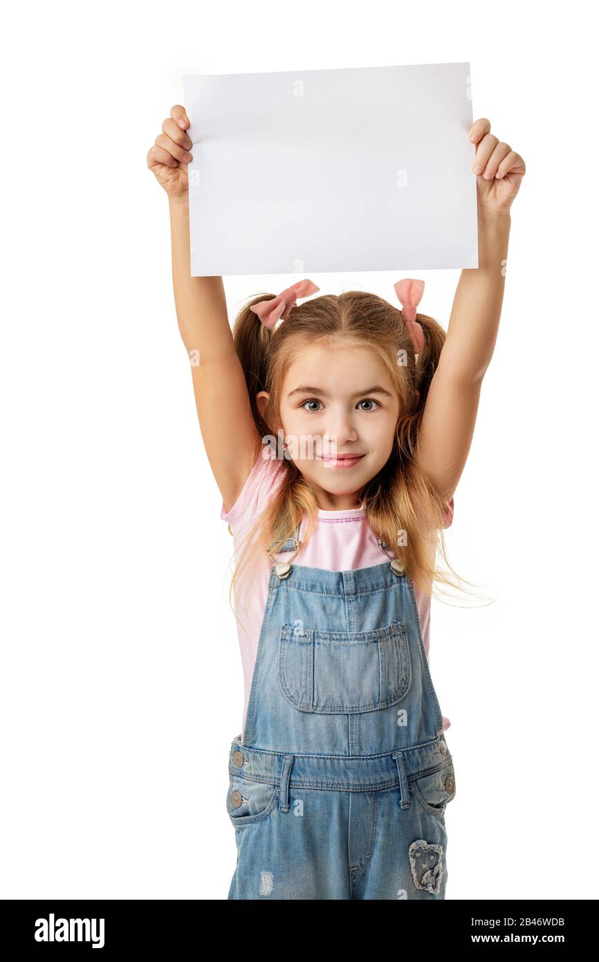 Happy cute child holding empty blank isolated on white background. kid ...