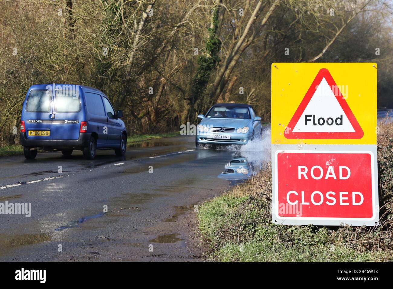 Two red triangle road signs hi-res stock photography and images - Alamy