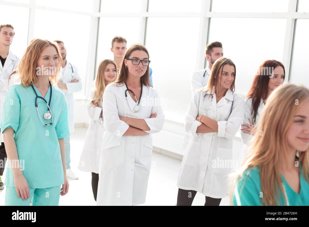 Group of female nurses walking hi-res stock photography and images - Alamy