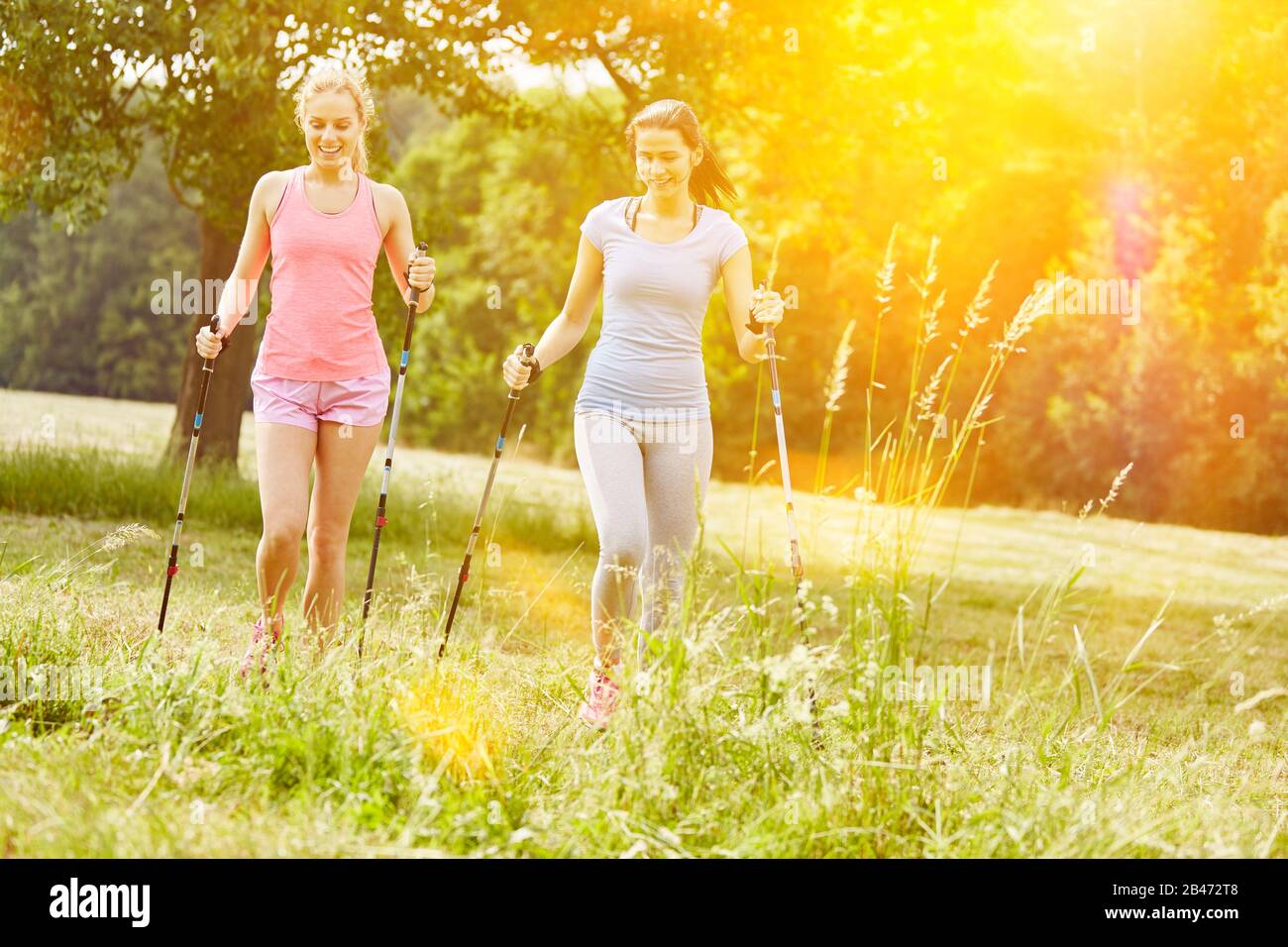 Two people walking together two people walking in the countryside hi ...