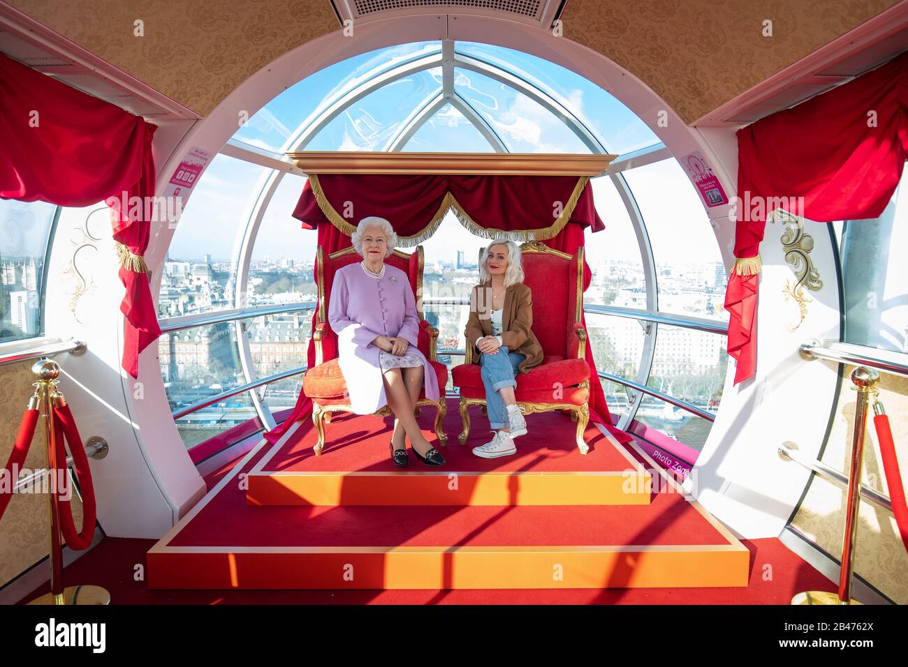 A person observe a figure of Queen Elizabeth II by Madame Tussaudsin ...