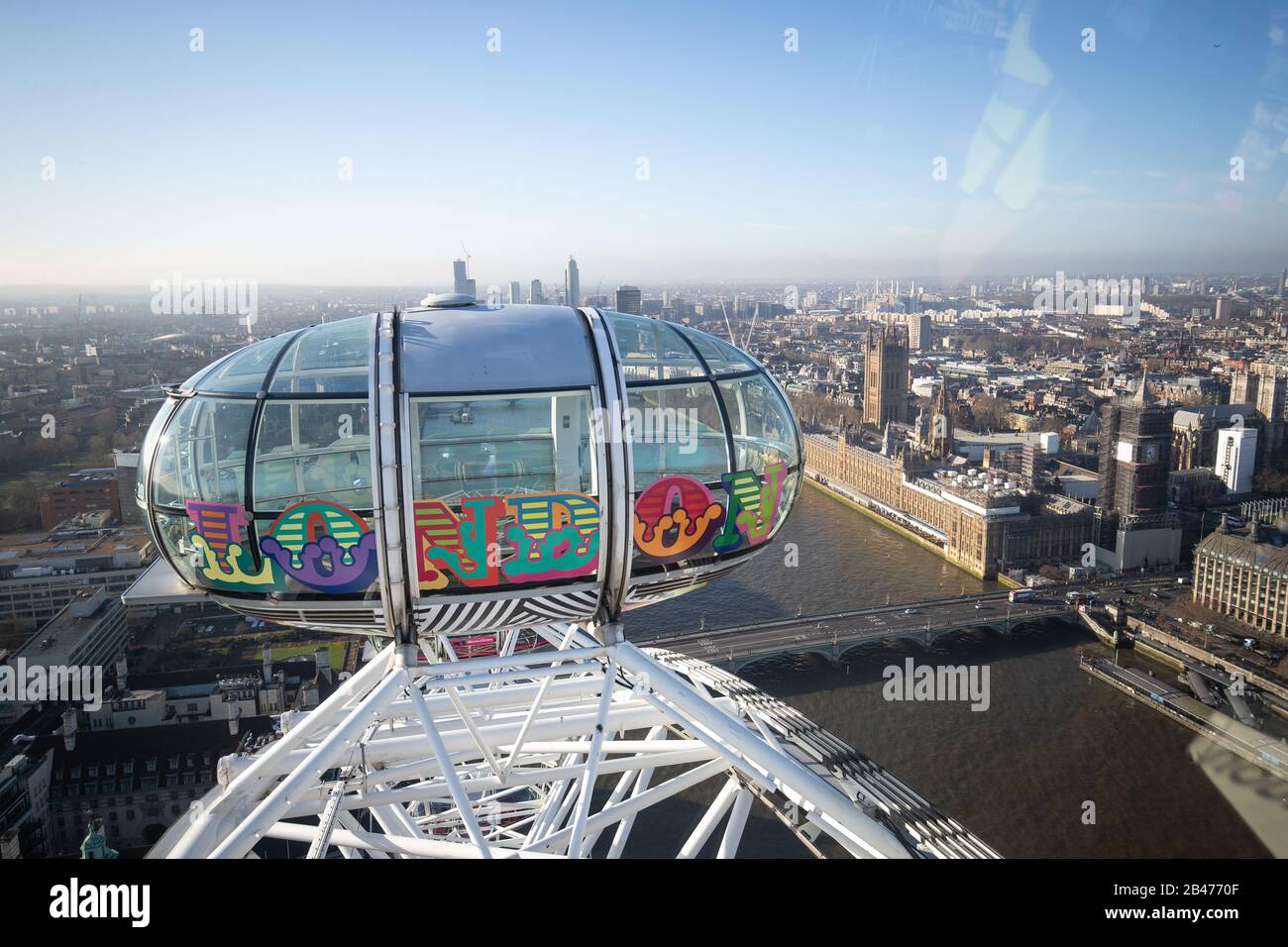 A street art wrapped pod by Ben Eine is seen as the London Eye marks ...