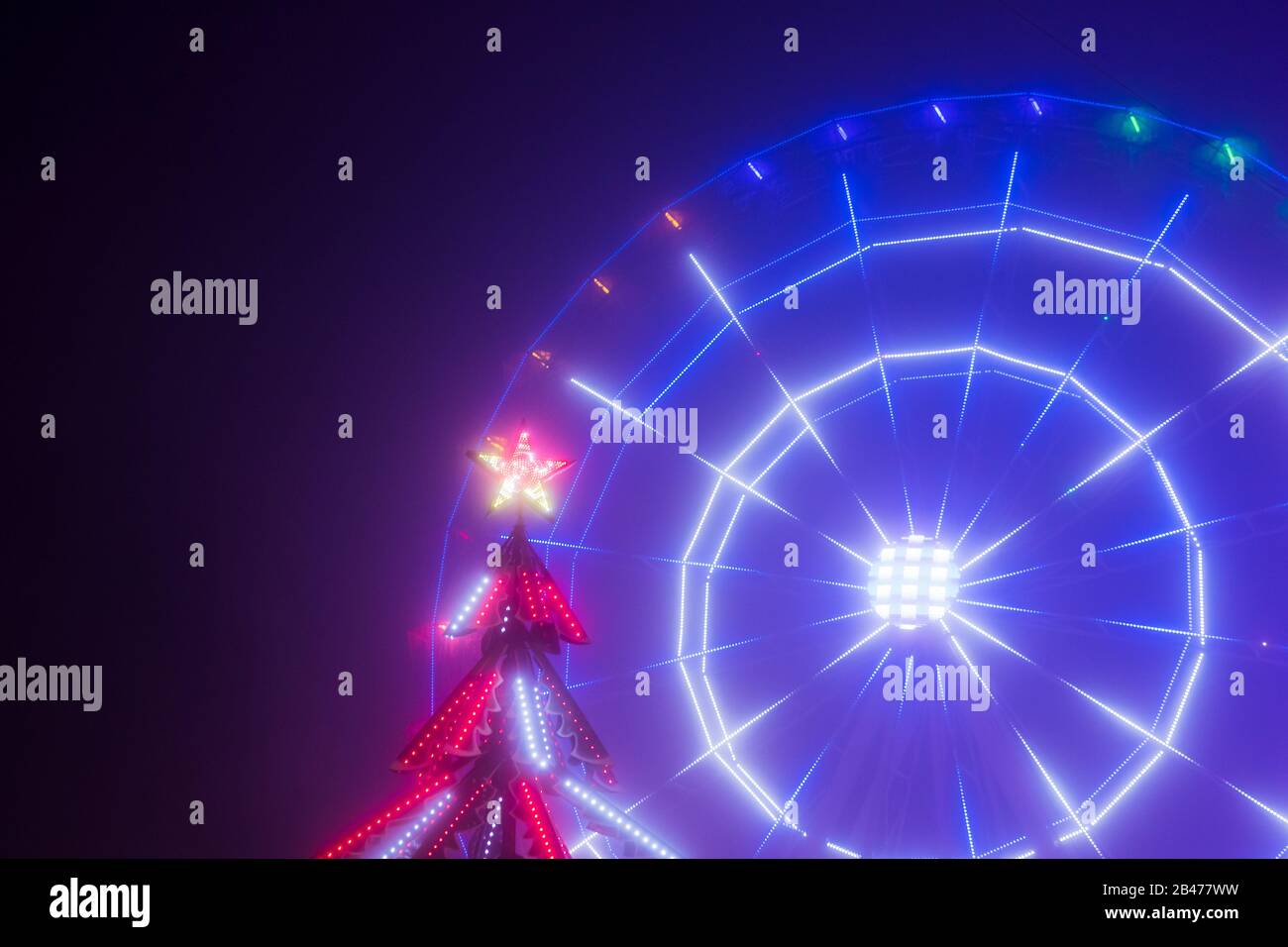 Aerial view of illuminated ferris wheel at night hi-res stock ...