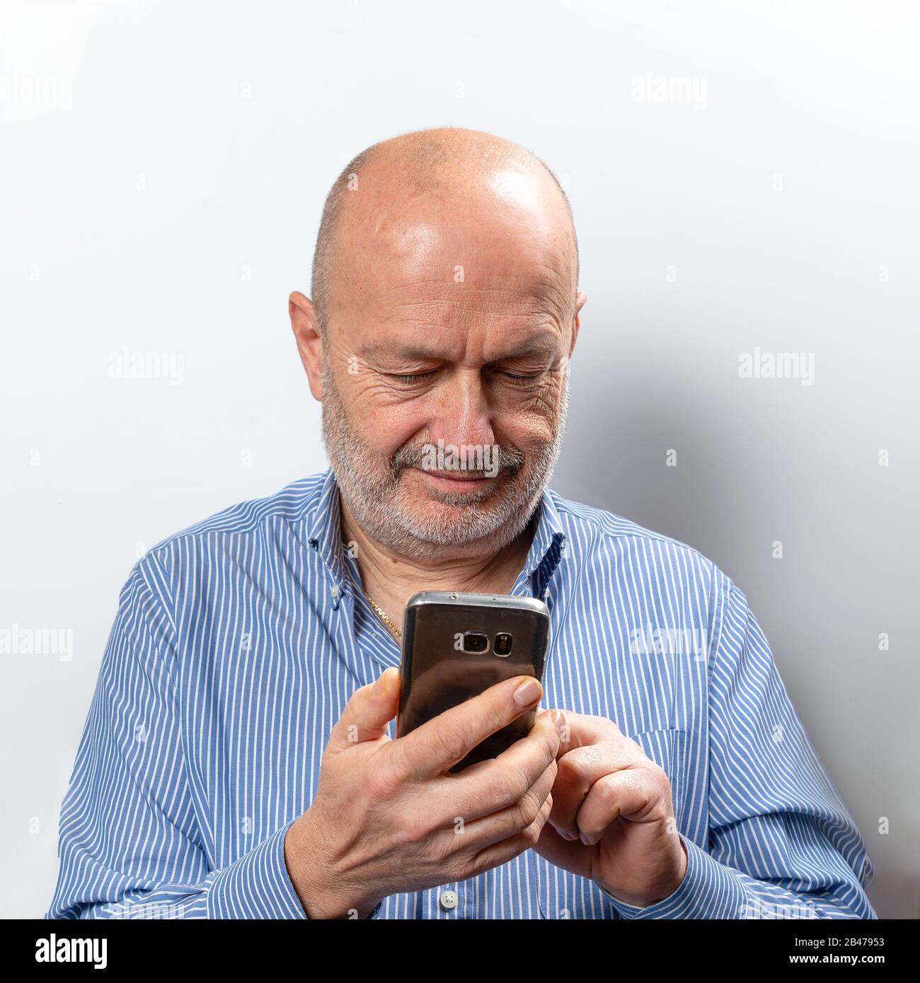 Happy middle aged businessman talking hi-res stock photography and ...