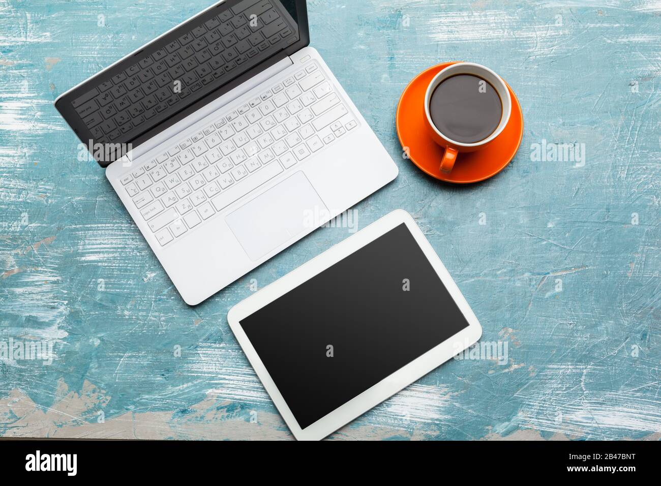 Top view office stuff with laptop and coffee Stock Photo - Alamy