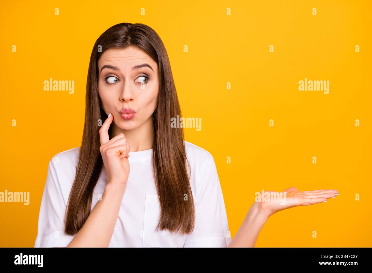 Photo of pretty business lady hold novelty selling product on open palm ...