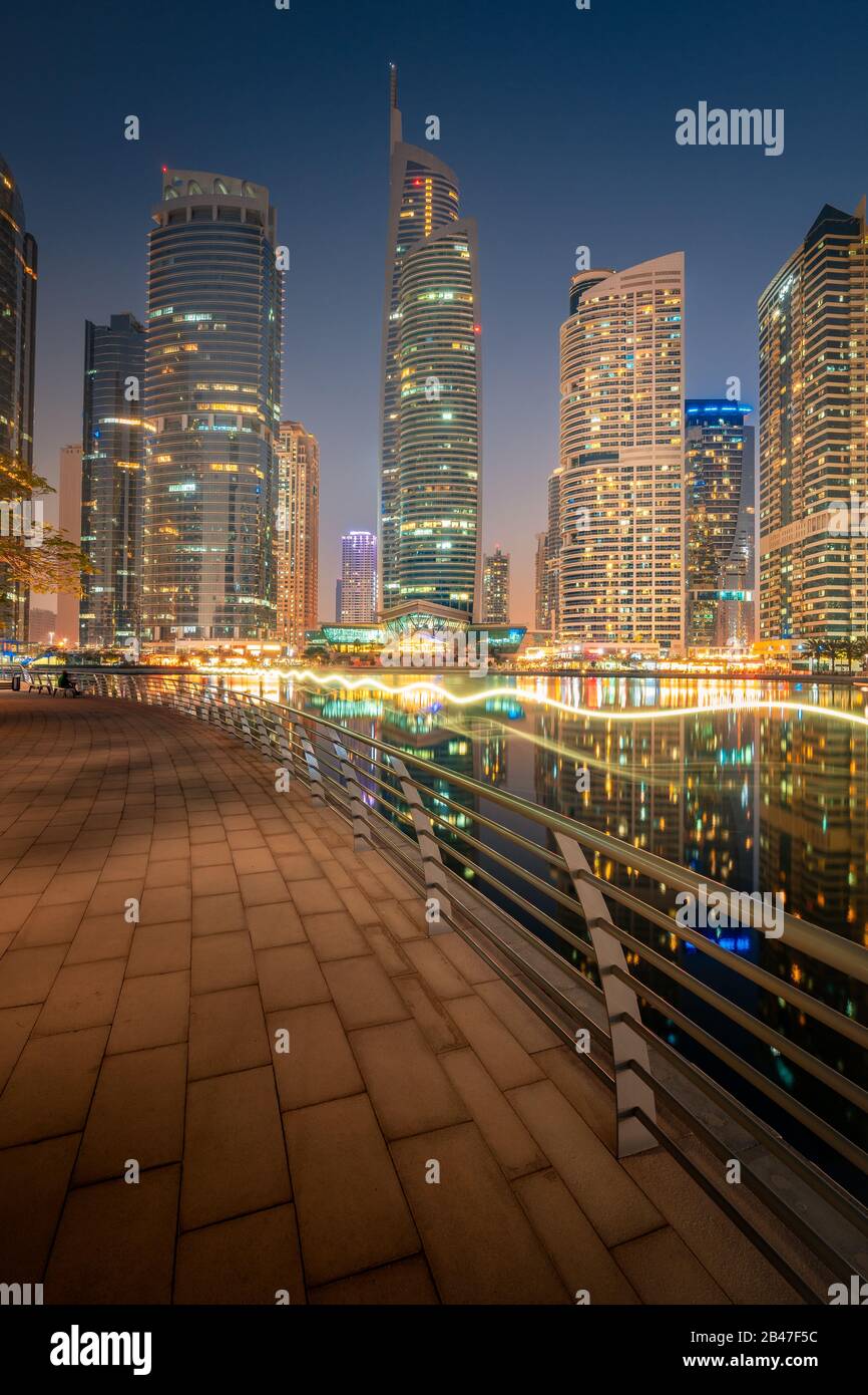 Amazing architecture parallel buildings. Cloudy night sky. Luxury ...