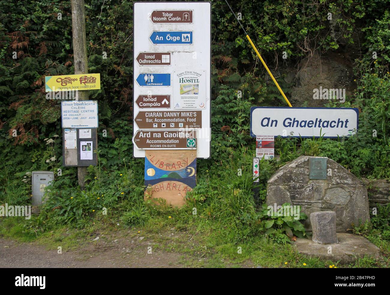 Local direction signs at the harbour on Cape Clear Island for visitors ...