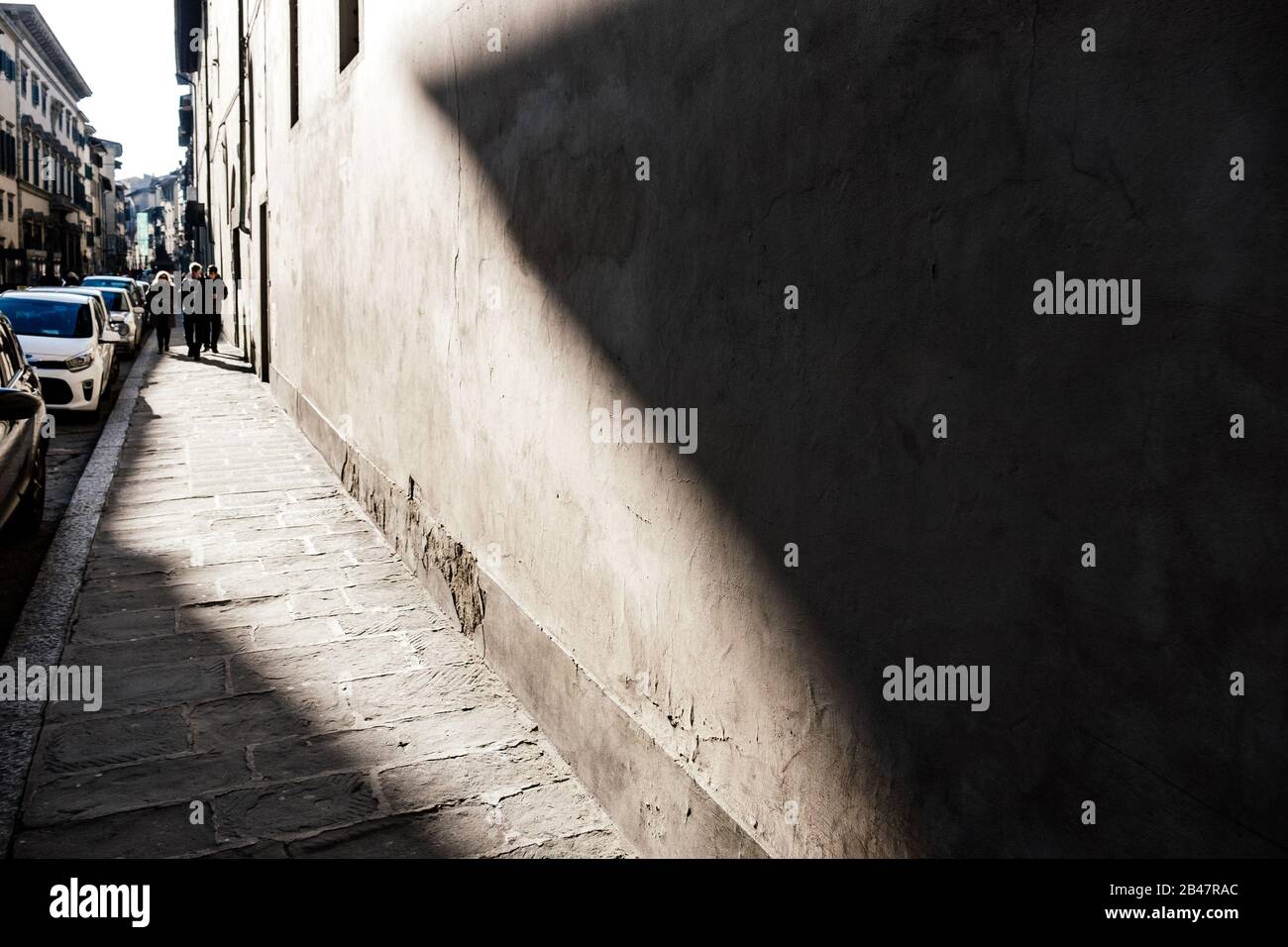Shadow and light on a wall in a city Stock Photo - Alamy