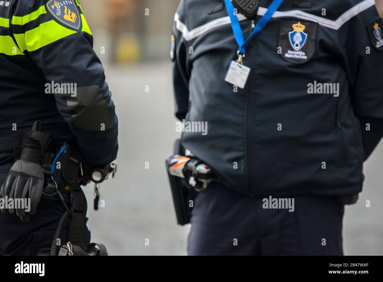 Police And Mar In Discussing At The Dam Square Amsterdam The ...