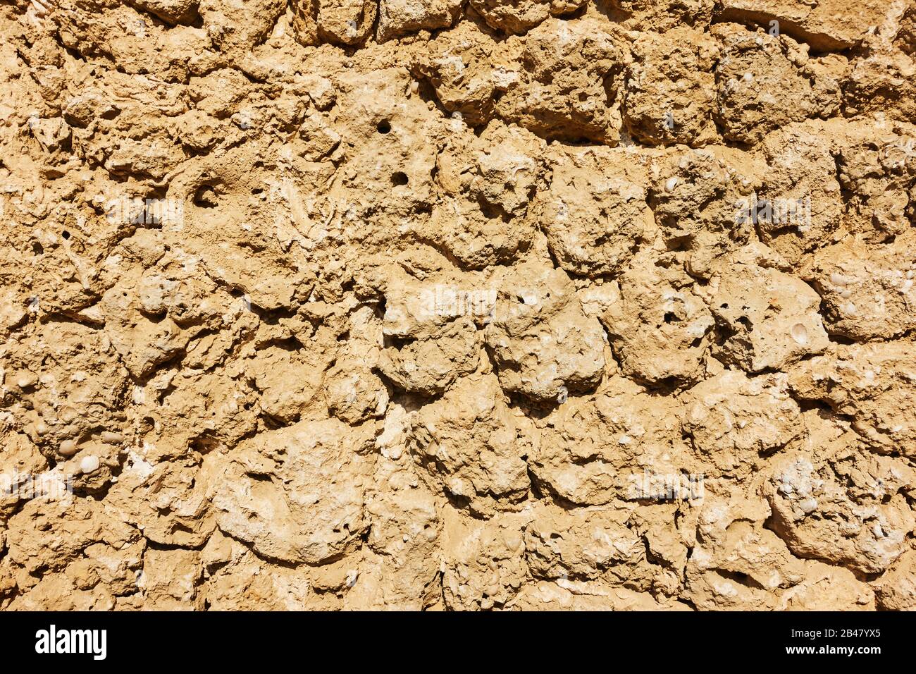 Texture of remains of ancient surrounding wall in Dubai, UAE Stock ...