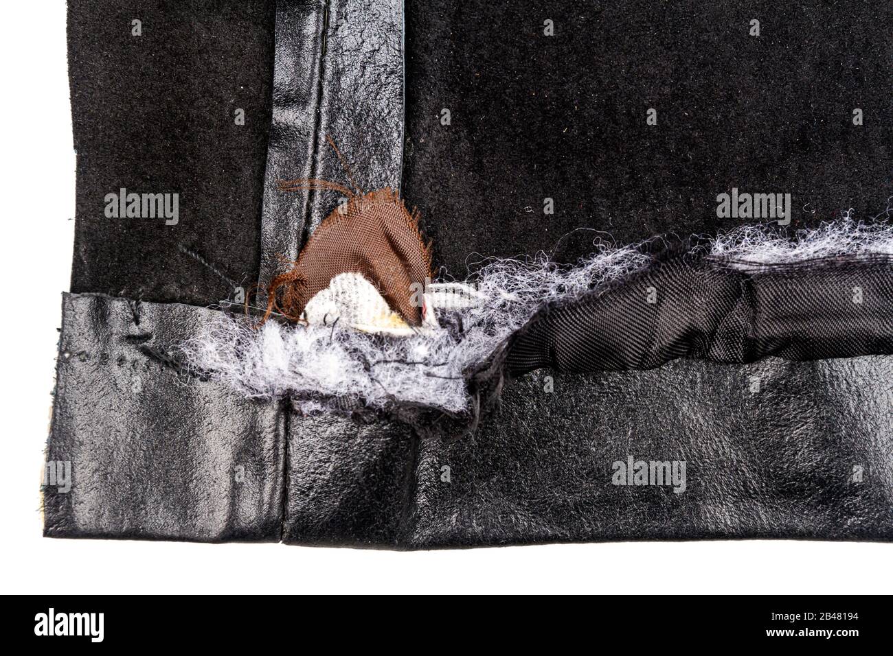 Piece of messy black leather isolated on white background. Crumpled ...