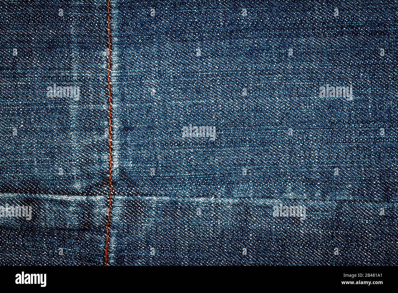 Dark blue jeans texture. Denim fabric background with a seam Stock ...