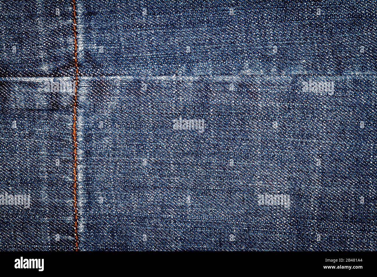 Dark blue jeans texture. Denim fabric background with a seam Stock ...