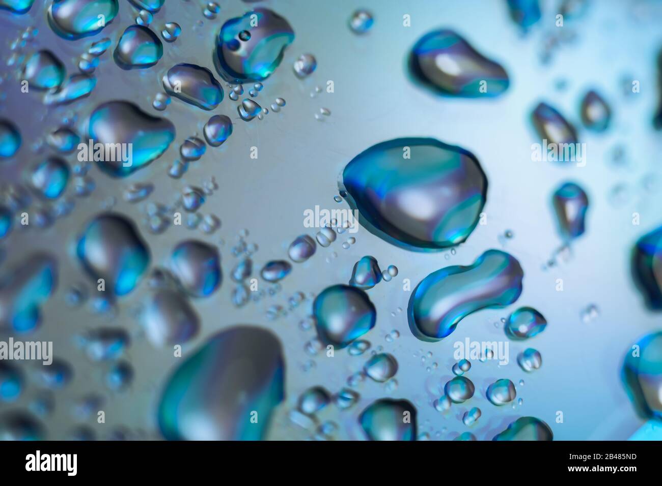 Close up beautiful abstraction phantom blue color light water drop of ...