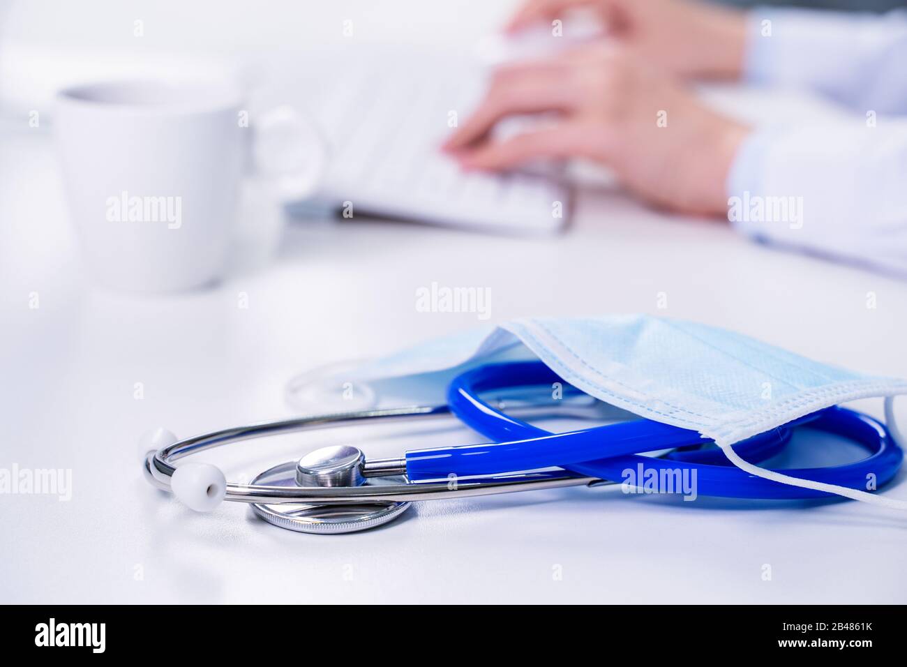 Business concept - Young female doctor woman working at office with ...