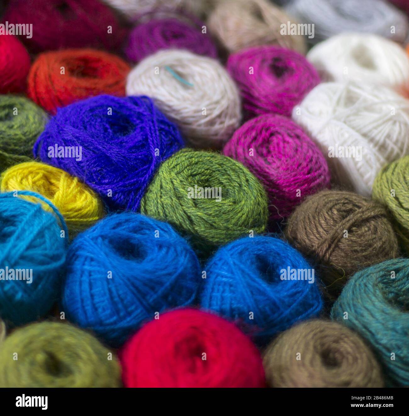 wool yarn ball. Colorful threads for needlework. Colorful fabric ...