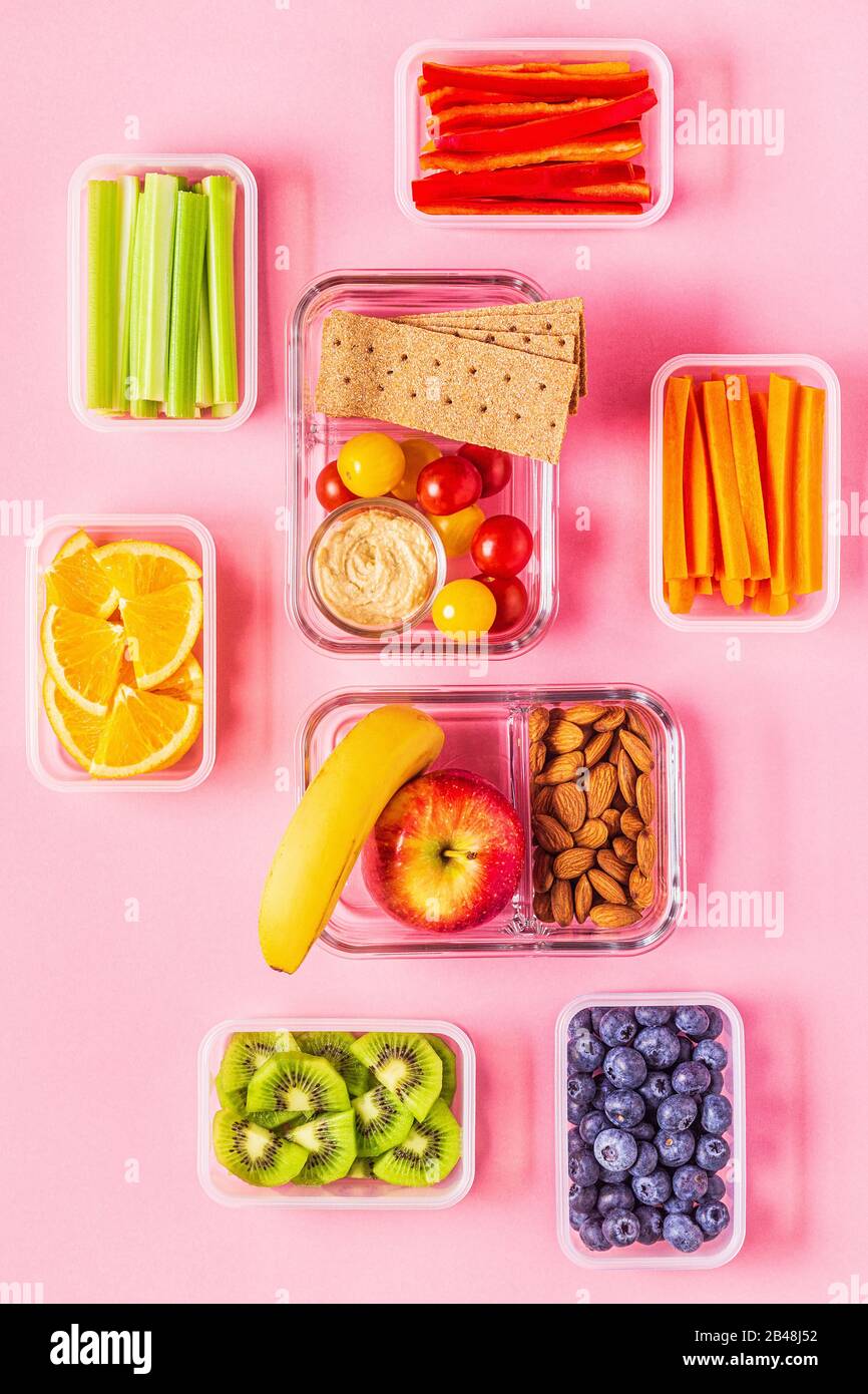 Healthy snack on a pastel background, top view Stock Photo - Alamy