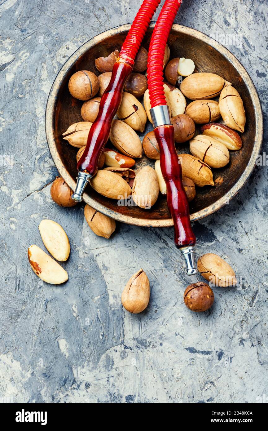 Tobacco smoking hookah with the aroma of nuts Stock Photo - Alamy