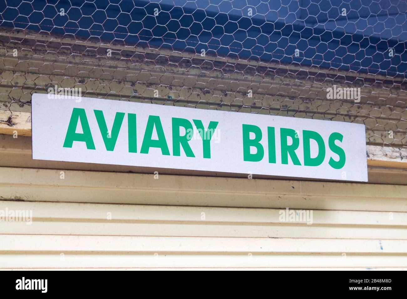 Aviary birds sign hanging in front of a garage building in Bangalow ...