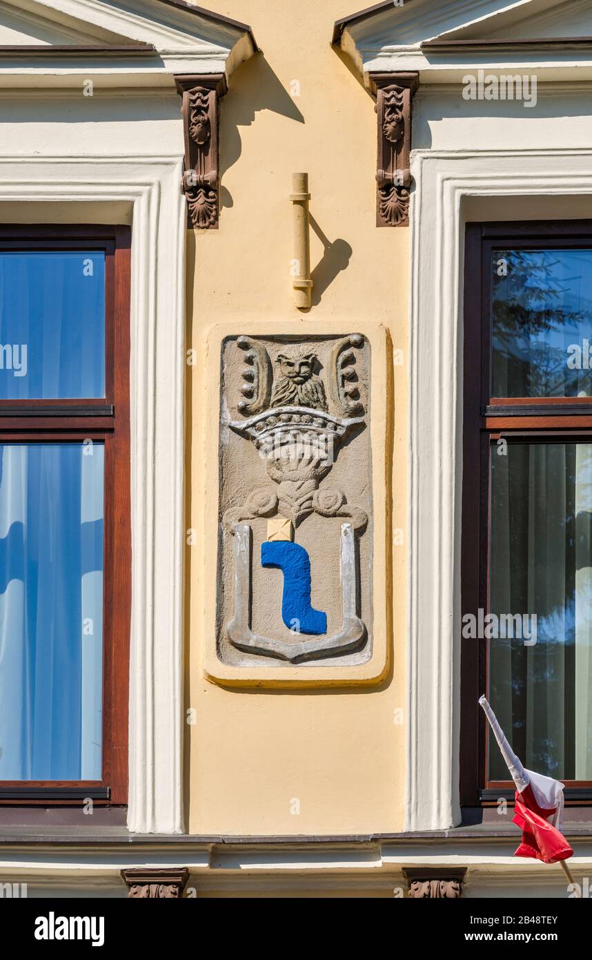 Town coat of arms at Ratusz (Town Hall), 1894, in Lesko, Malopolska ...