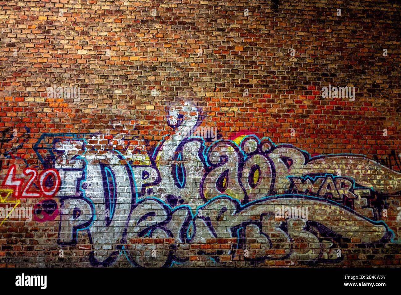 graffiti on a brick wall Stock Photo - Alamy
