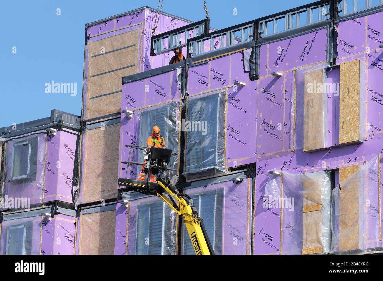 Prefabricated modular construction pods being assembled for student ...