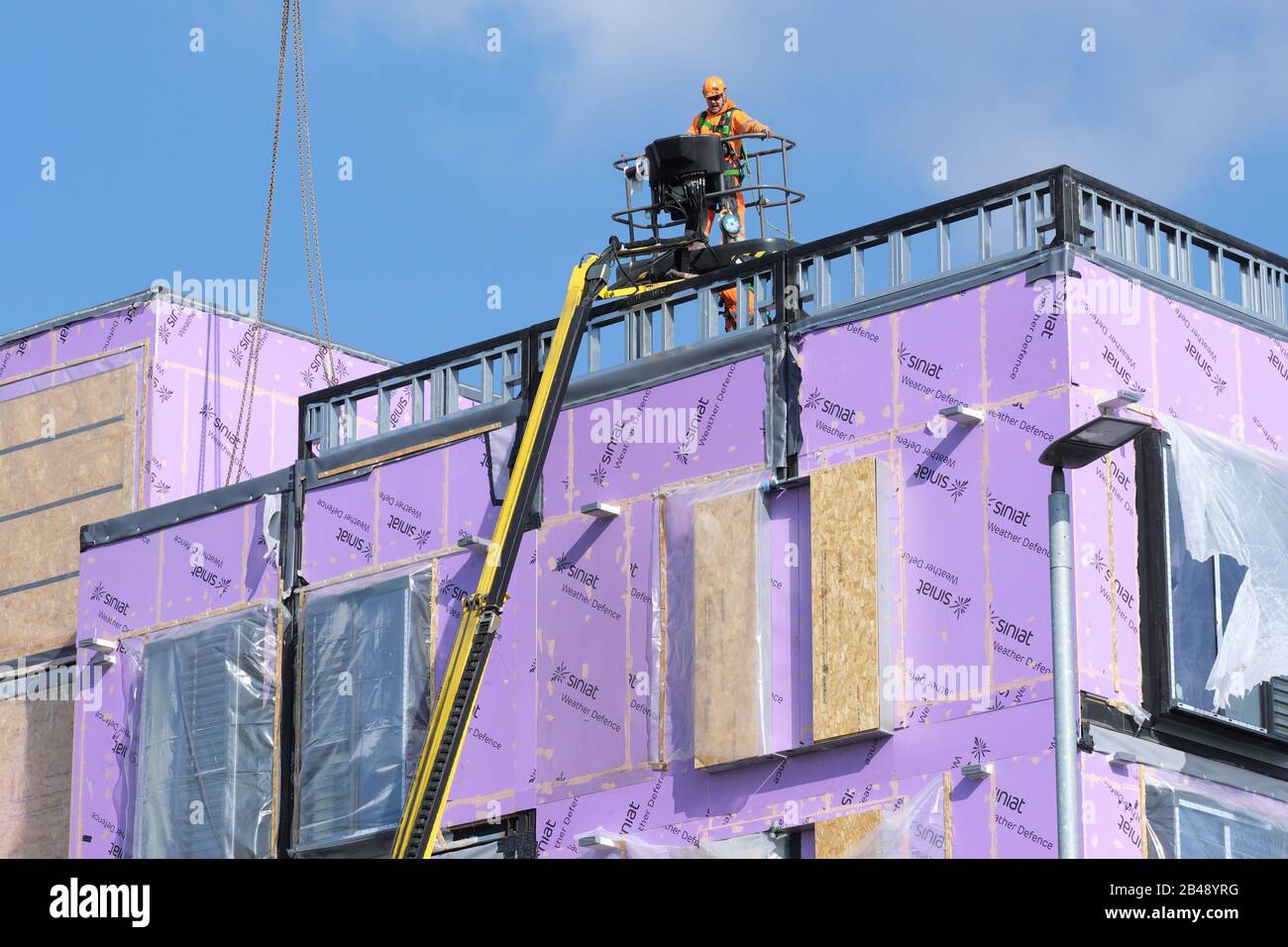Prefabricated modular construction pods being assembled for student ...