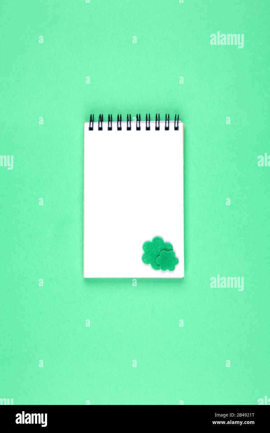 White Notepad on a mint background. Space for text Stock Photo - Alamy
