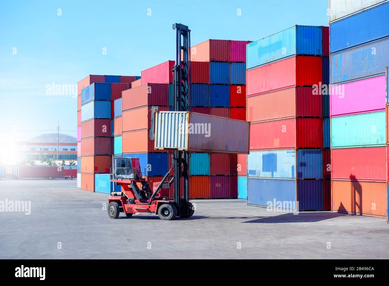 Container handlers in the harbor For imports and exports Stock Photo ...