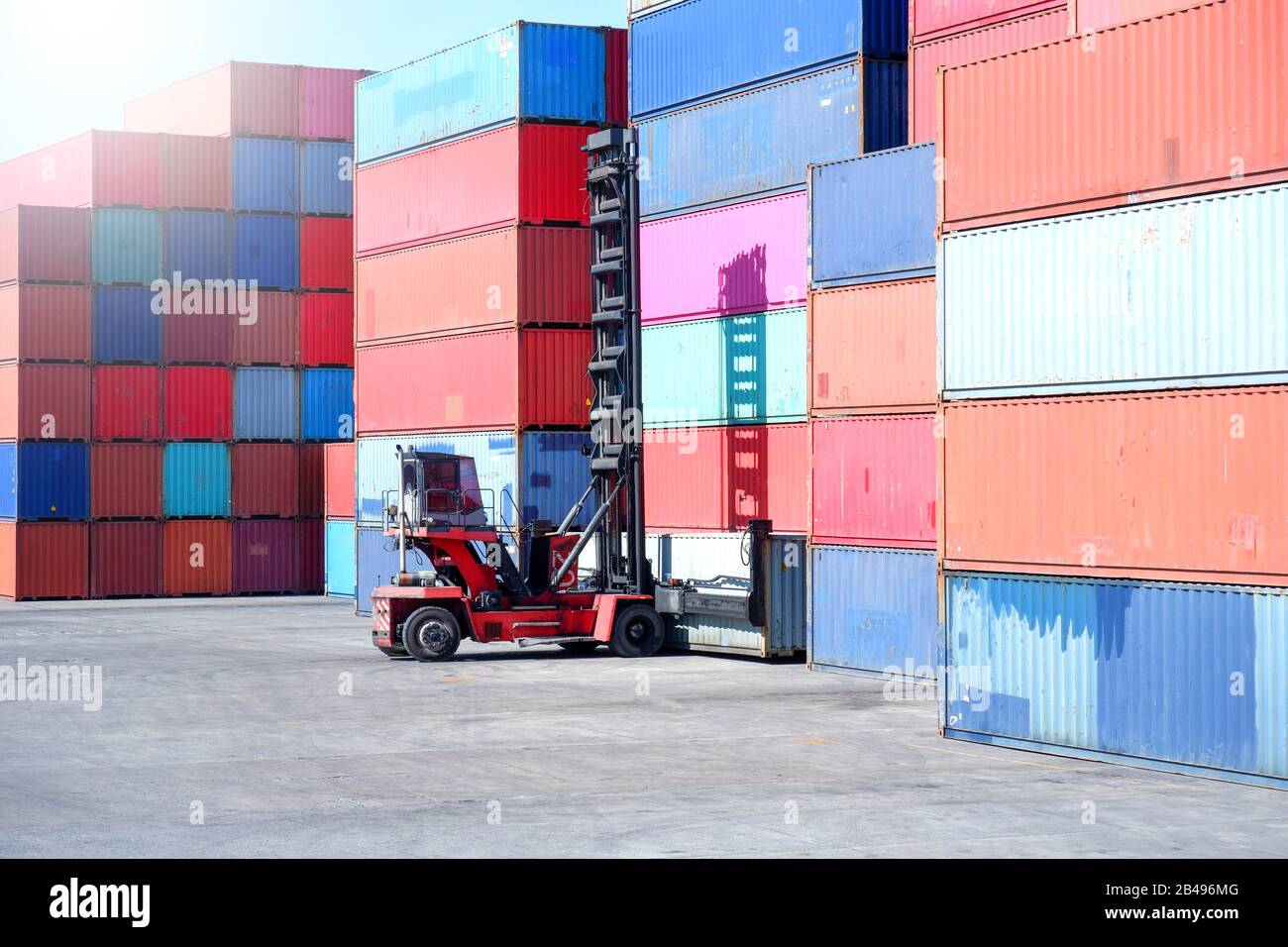 Container handlers in the harbor For imports and exports Stock Photo ...