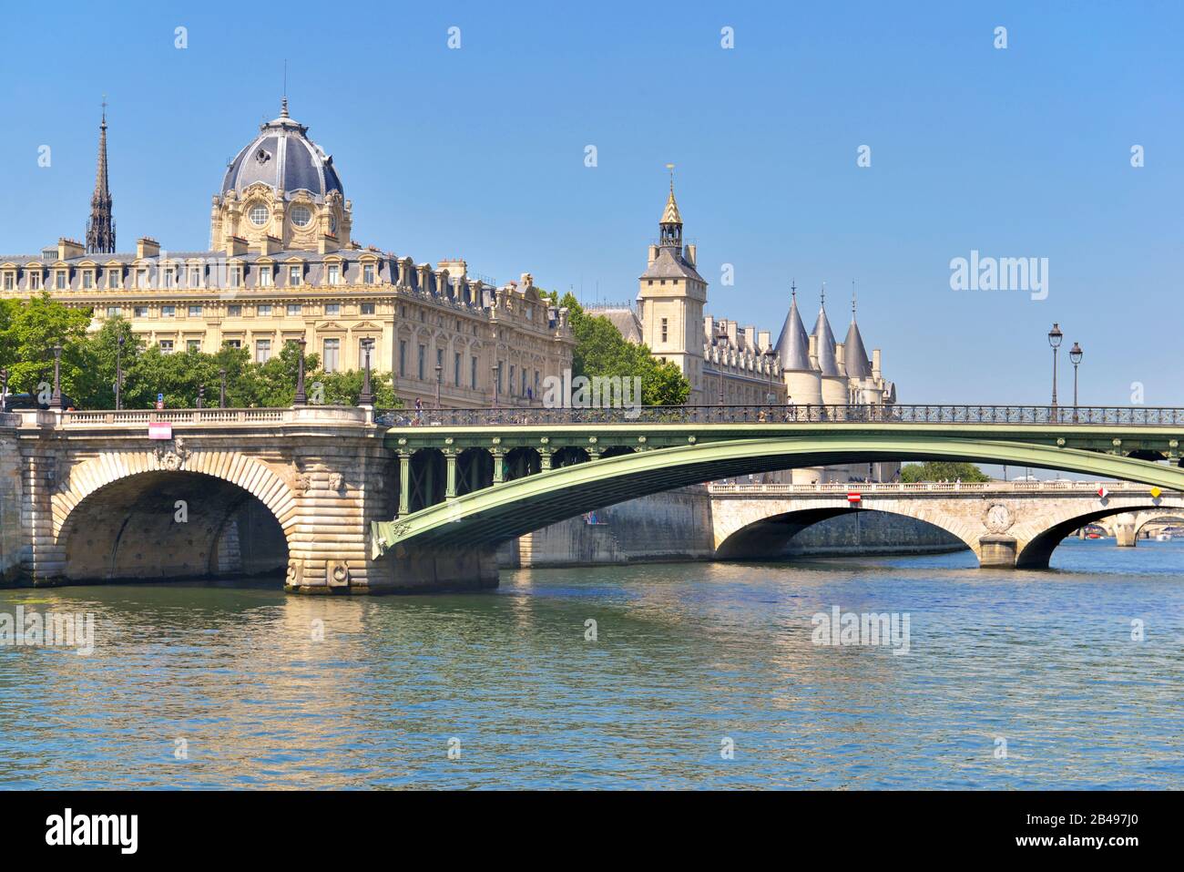 view on ancient building of the conciergerie and bridge of Sully from ...