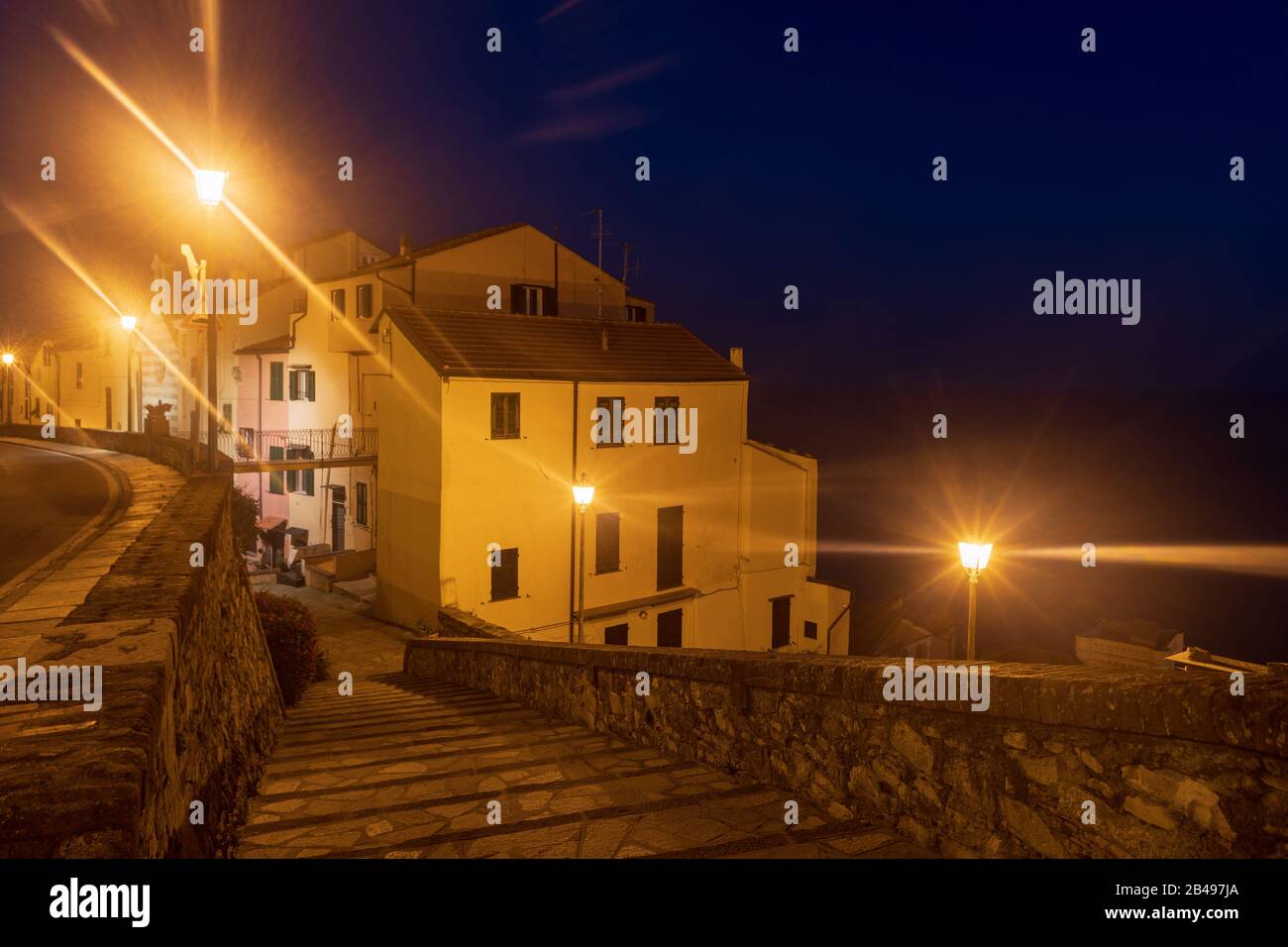 Night scene in the old town of Imperia, seaside city on the Italian ...