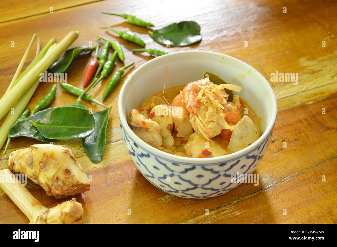 spicy shrimp and fish tom yum soup in bowl Stock Photo - Alamy