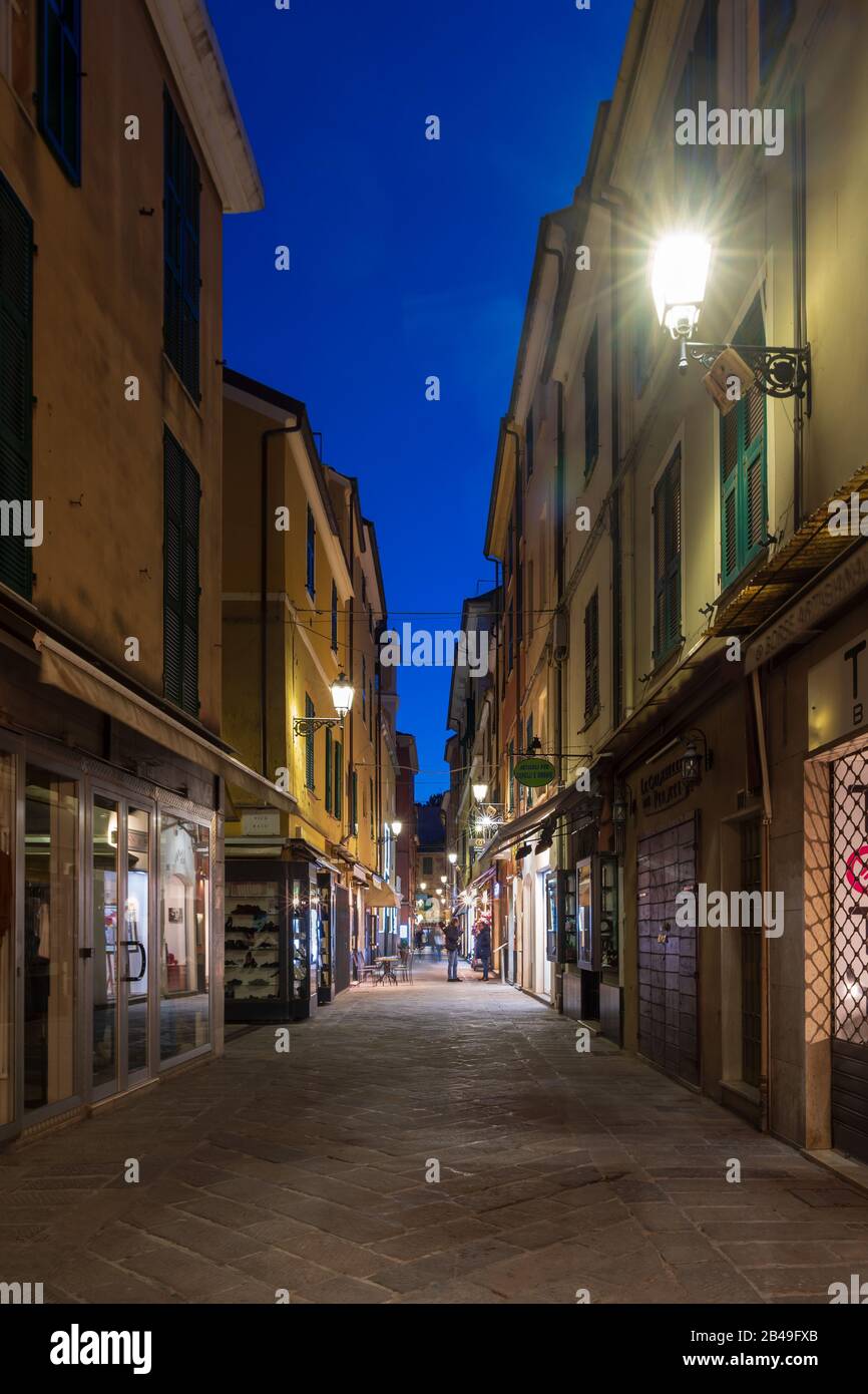 View along typical Italian narrow street in Alassio old town, Liguria ...