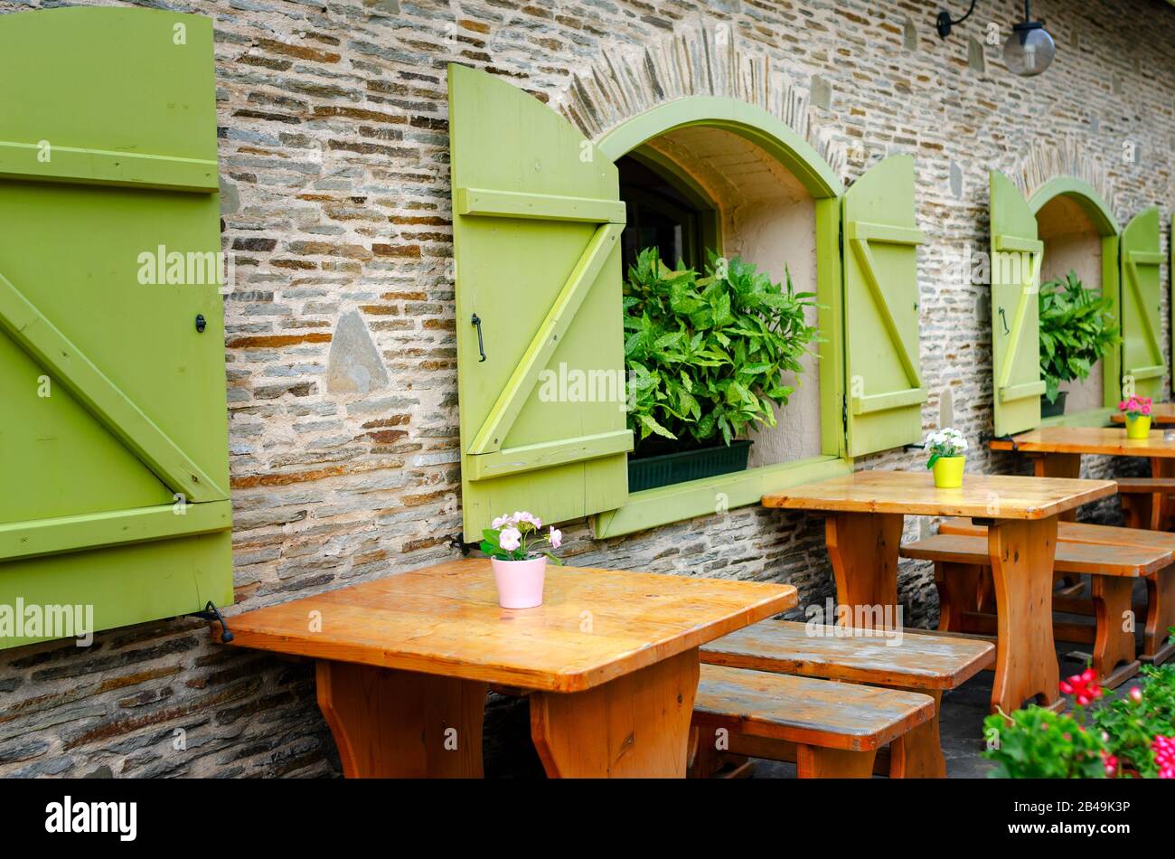 Exterior of the terrace of an open-air cafe Stock Photo - Alamy