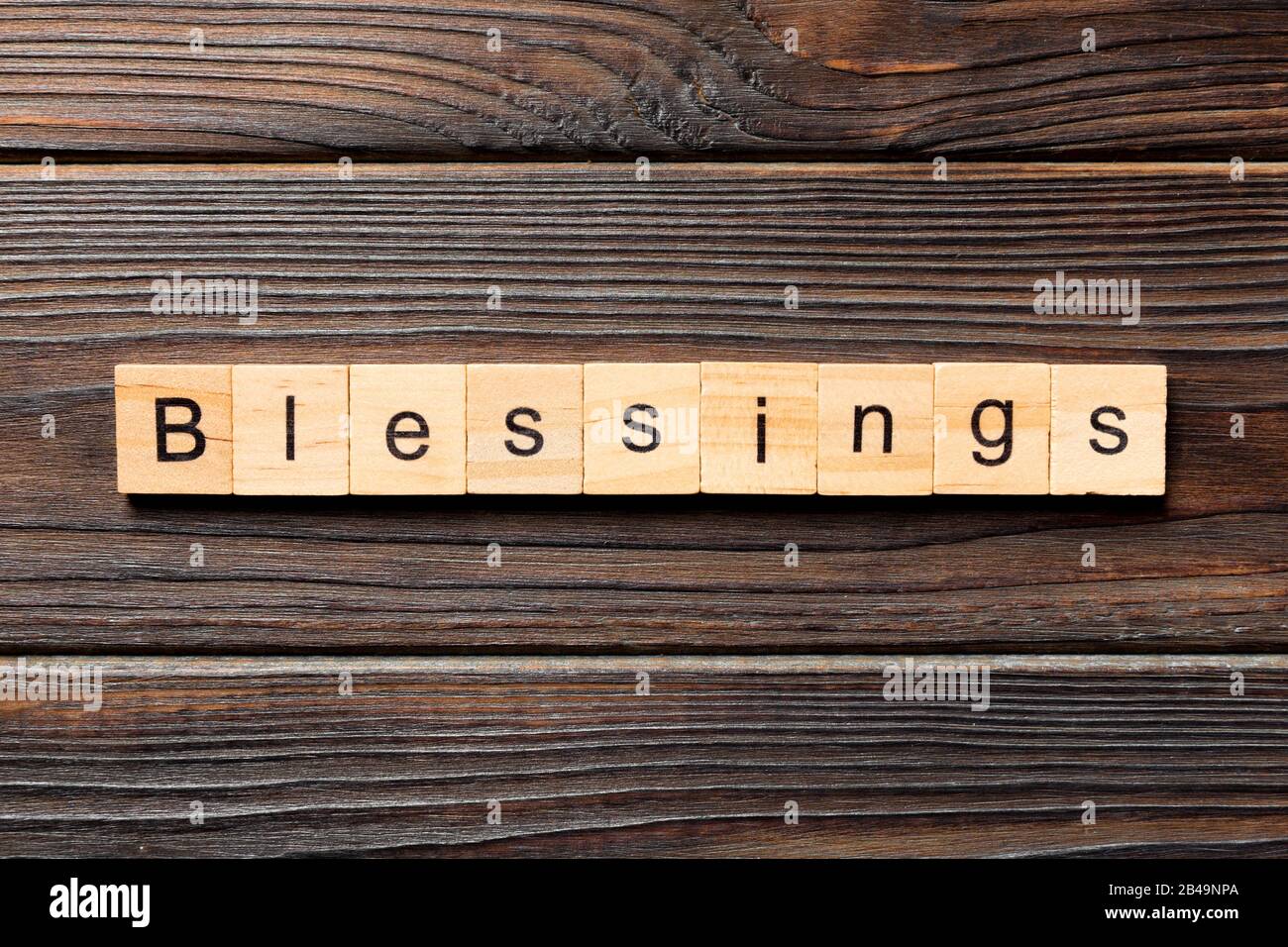 Blessings word written on wood block. Blessings text on wooden table ...