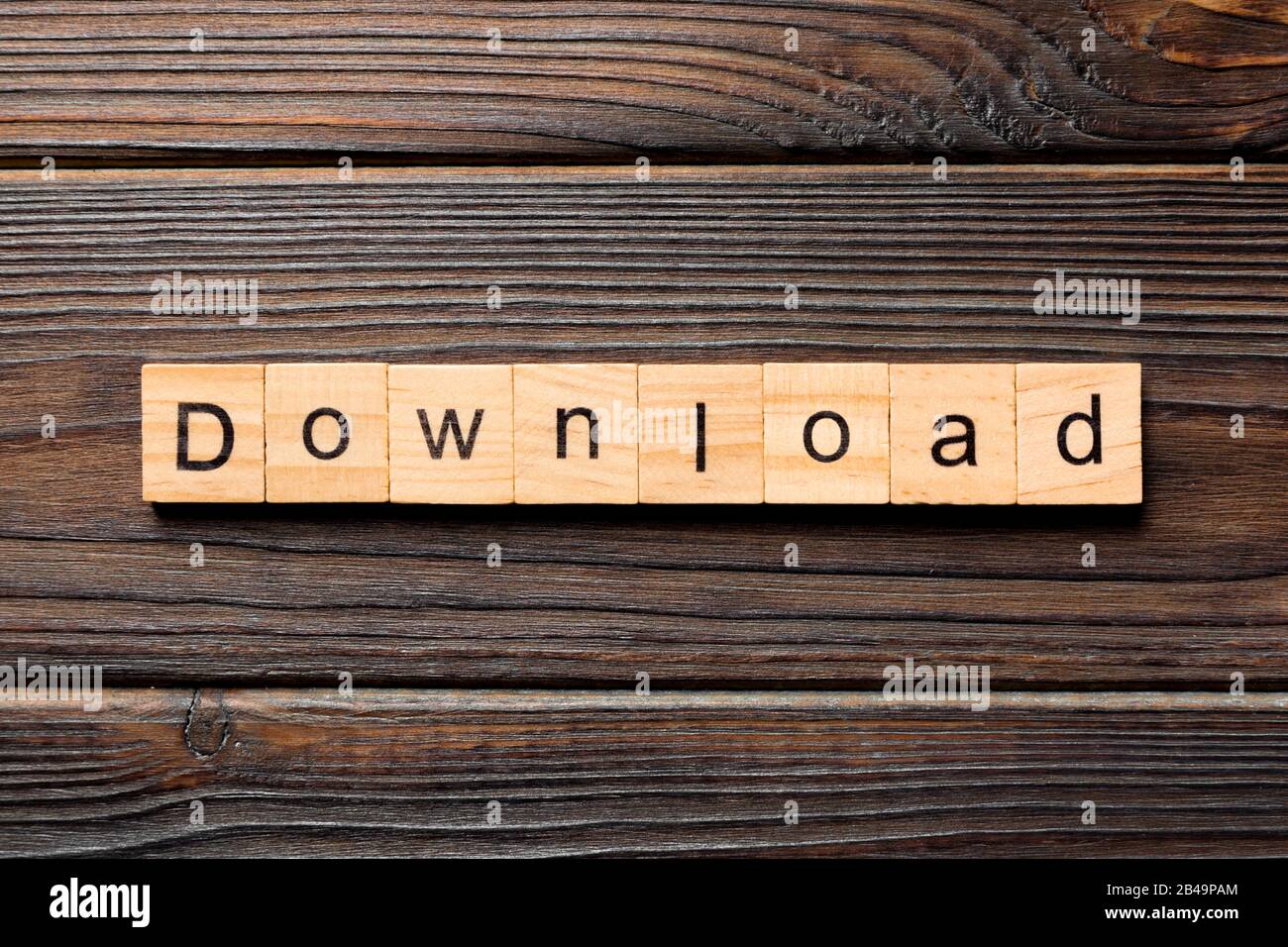 download word written on wood block. download text on table, concept ...