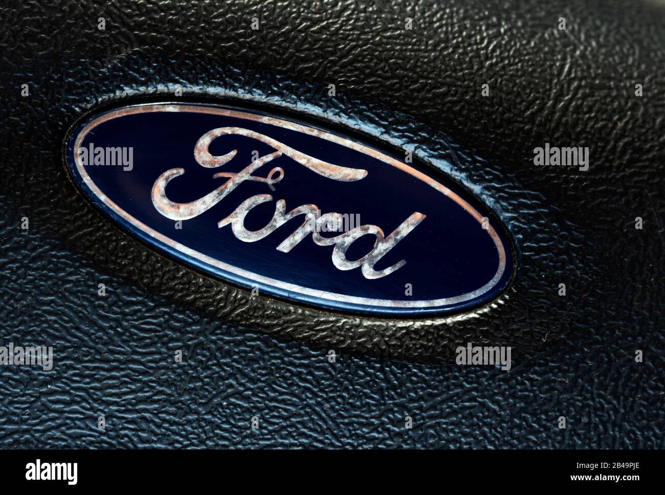 Ford logo on steering wheel Stock Photo - Alamy