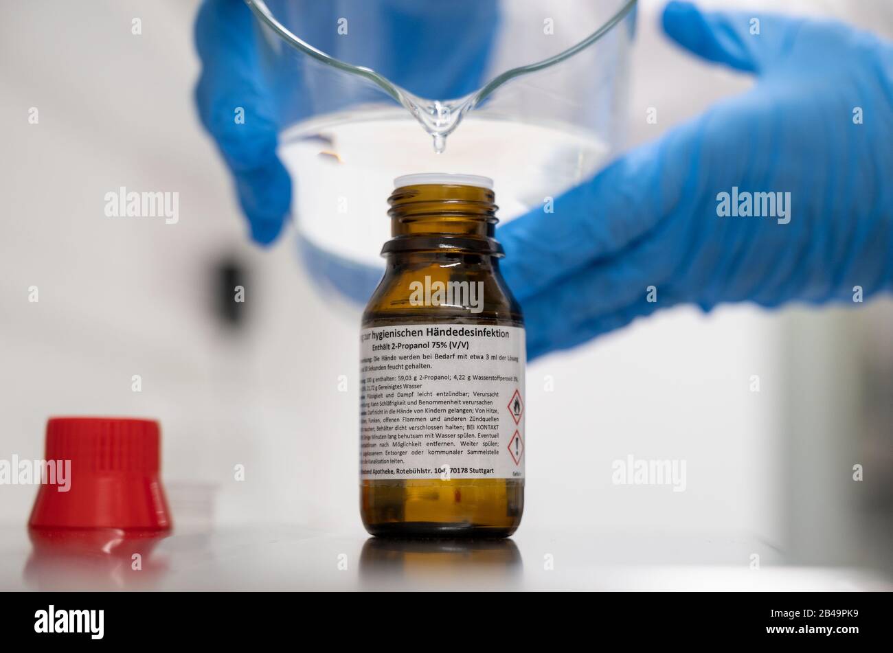 Stuttgart, Germany. 06th Mar, 2020. A pharmacy employee fills a vial ...