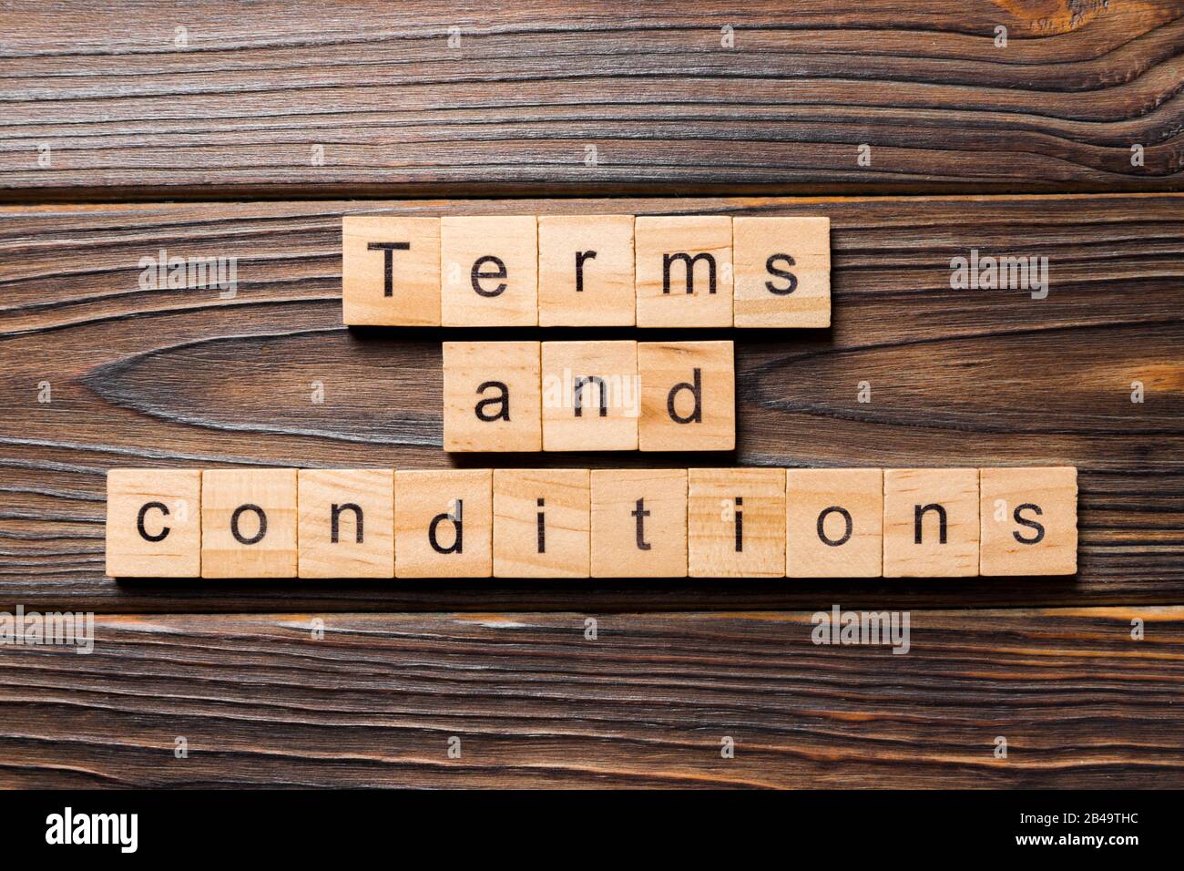Terms and conditions word written on wood block. Terms and conditions ...