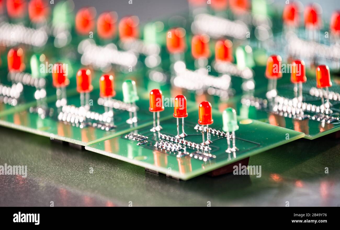 Close-up of a panel with red and green light bulbs indicators on a ...