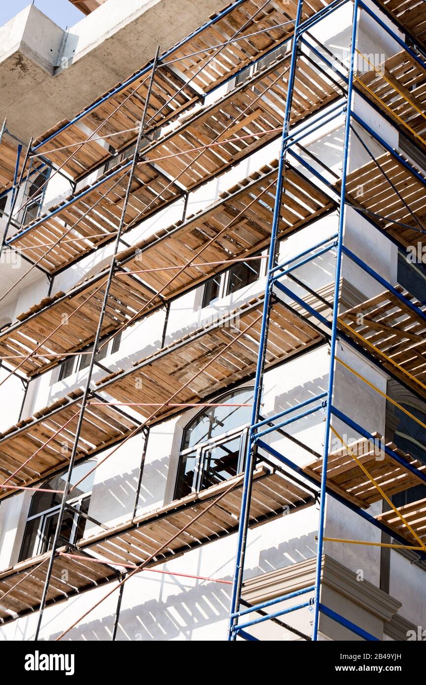 Extensive scaffolding for building a new house. Constraction of ...