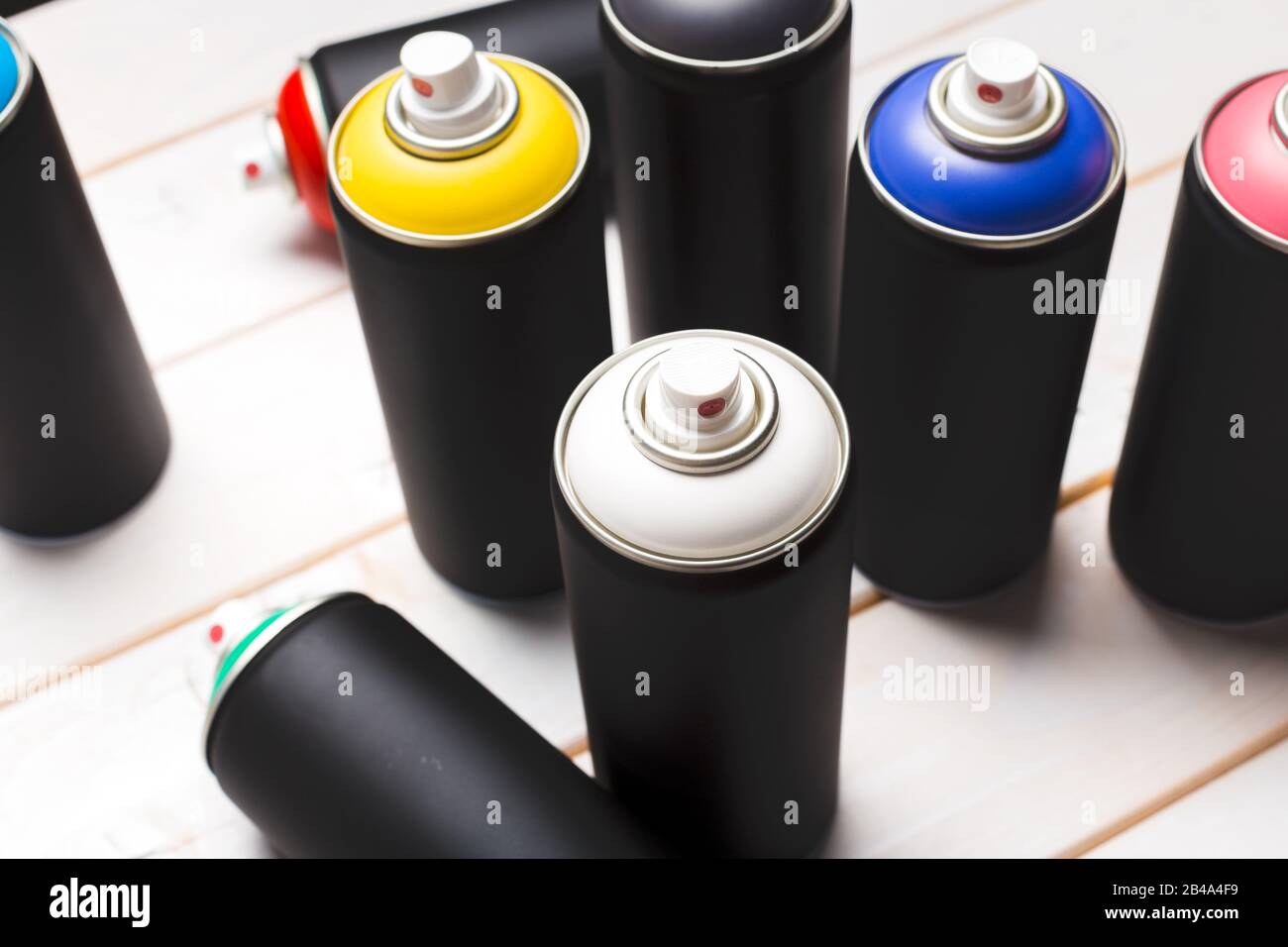 Spray paint cans close up. creative photo Stock Photo - Alamy