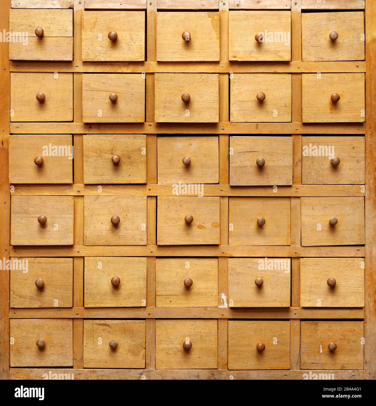 Backgrounds and textures: front of old wooden closet with drawers Stock ...