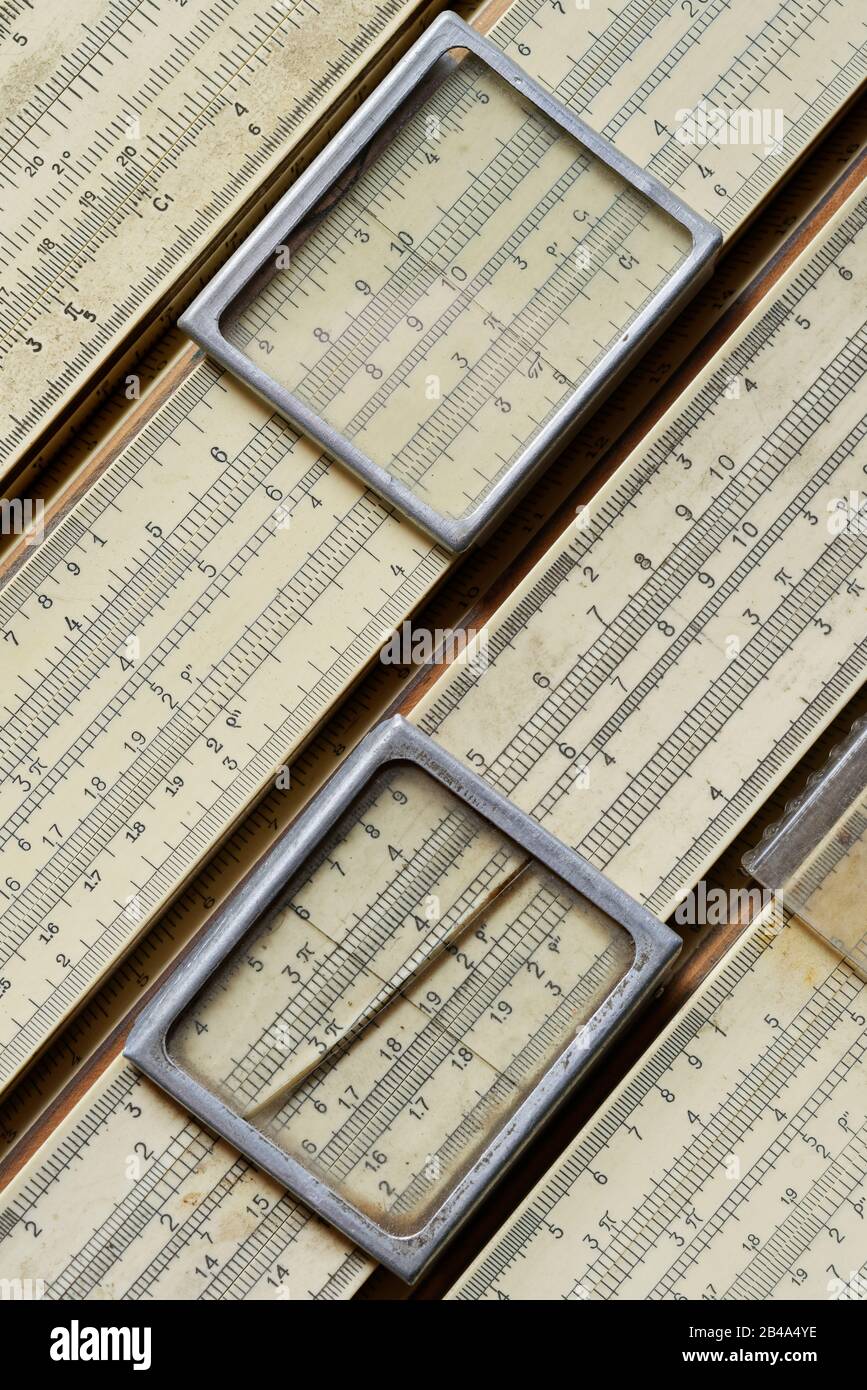 Backgrounds and textures: group of old slide rules, or slipsticks ...