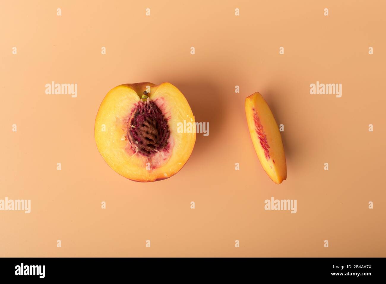 Ripe peach fruit slice. close up. creative photo Stock Photo - Alamy