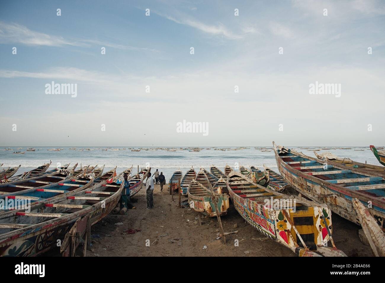 KAYAR, SENEGAL - JANUARY 17, 2020: Traditional painted wooden fishing ...