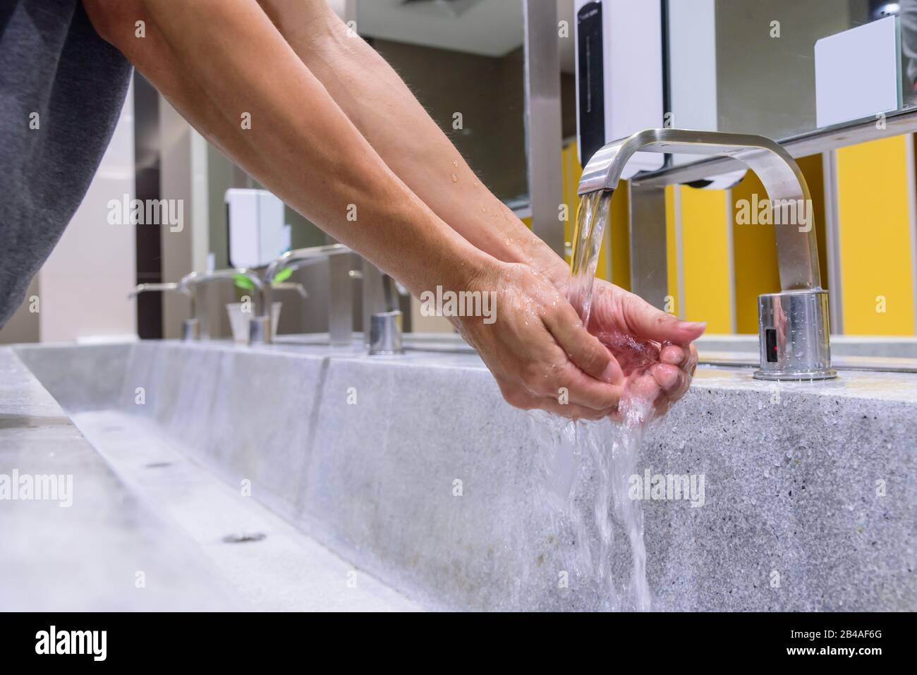 Wash hands by water / protect your health from disease Stock Photo - Alamy